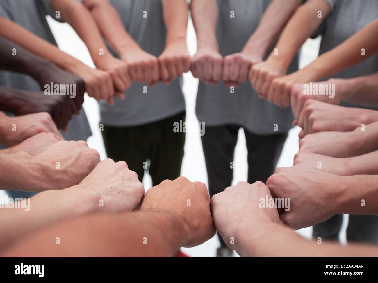 Multiracial hands making a circle hi-res stock photography and images ...
