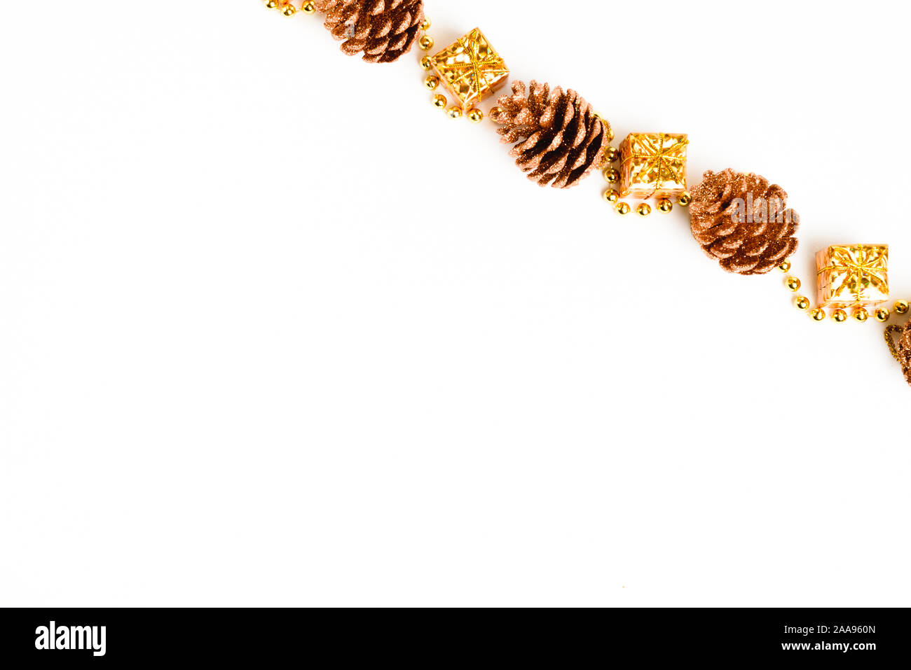 Christmas ornament of gold color, on a white background Stock Photo - Alamy