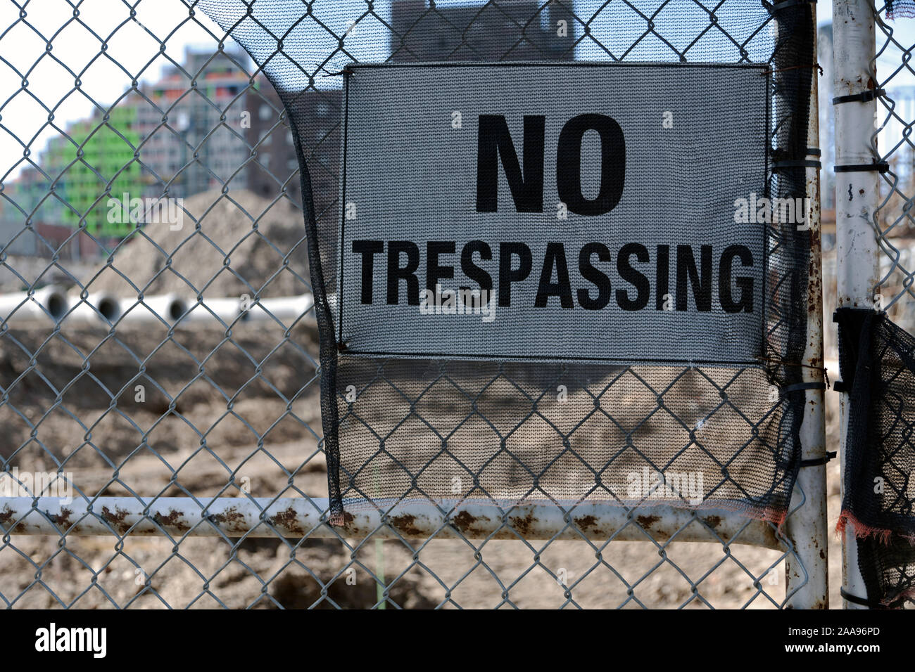 No Trespassing Sign at Construction Site Stock Photo - Alamy