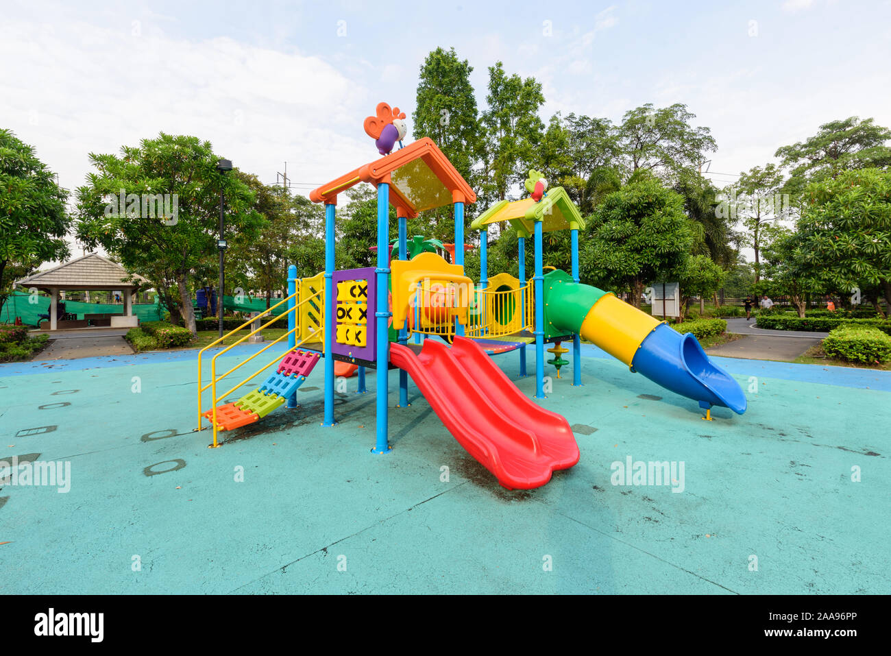 Big playground in public park and unidentified children playing it ...