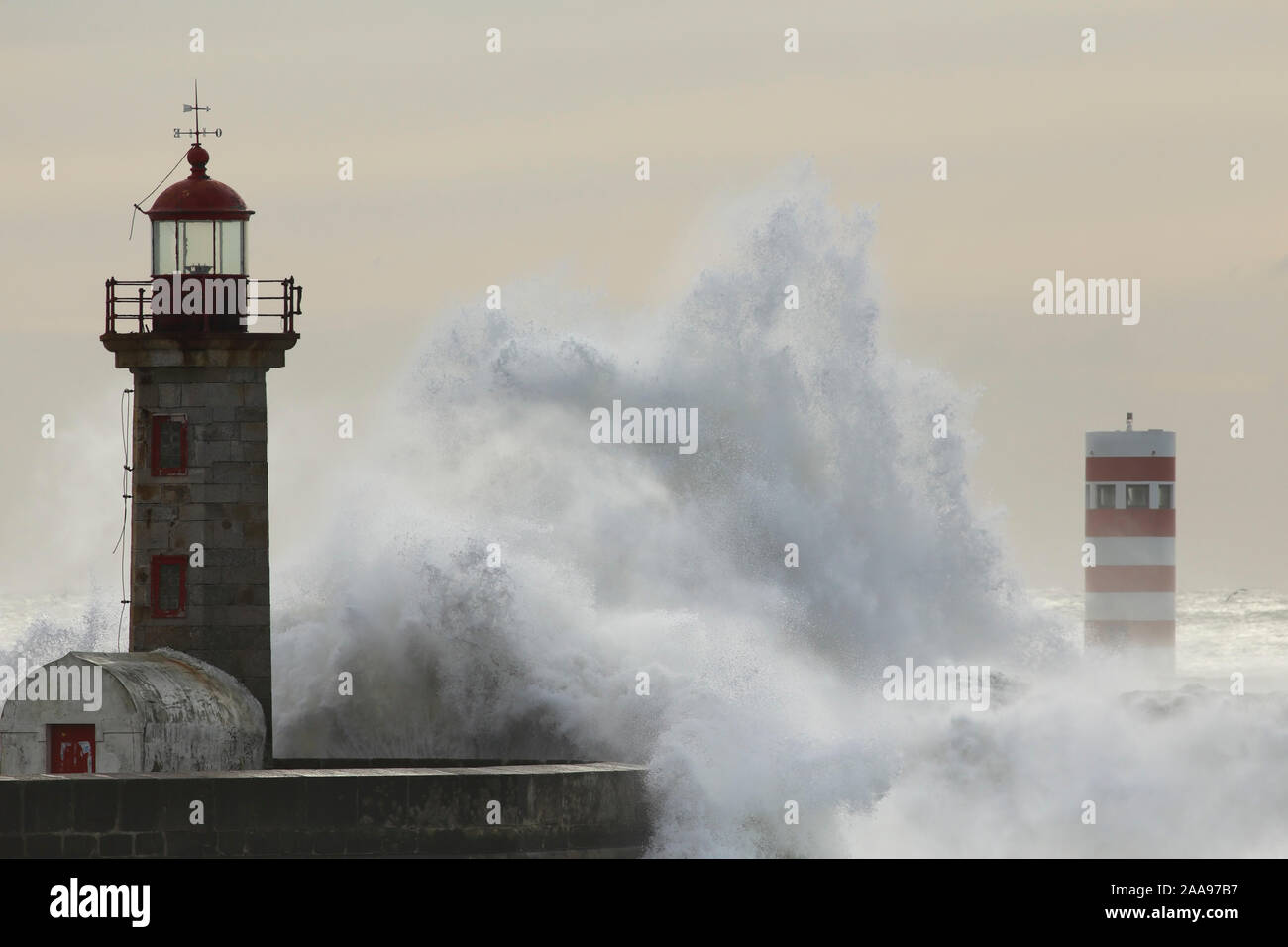 Big breaking sea waves over Douro river mouth piers and lighthouses ...