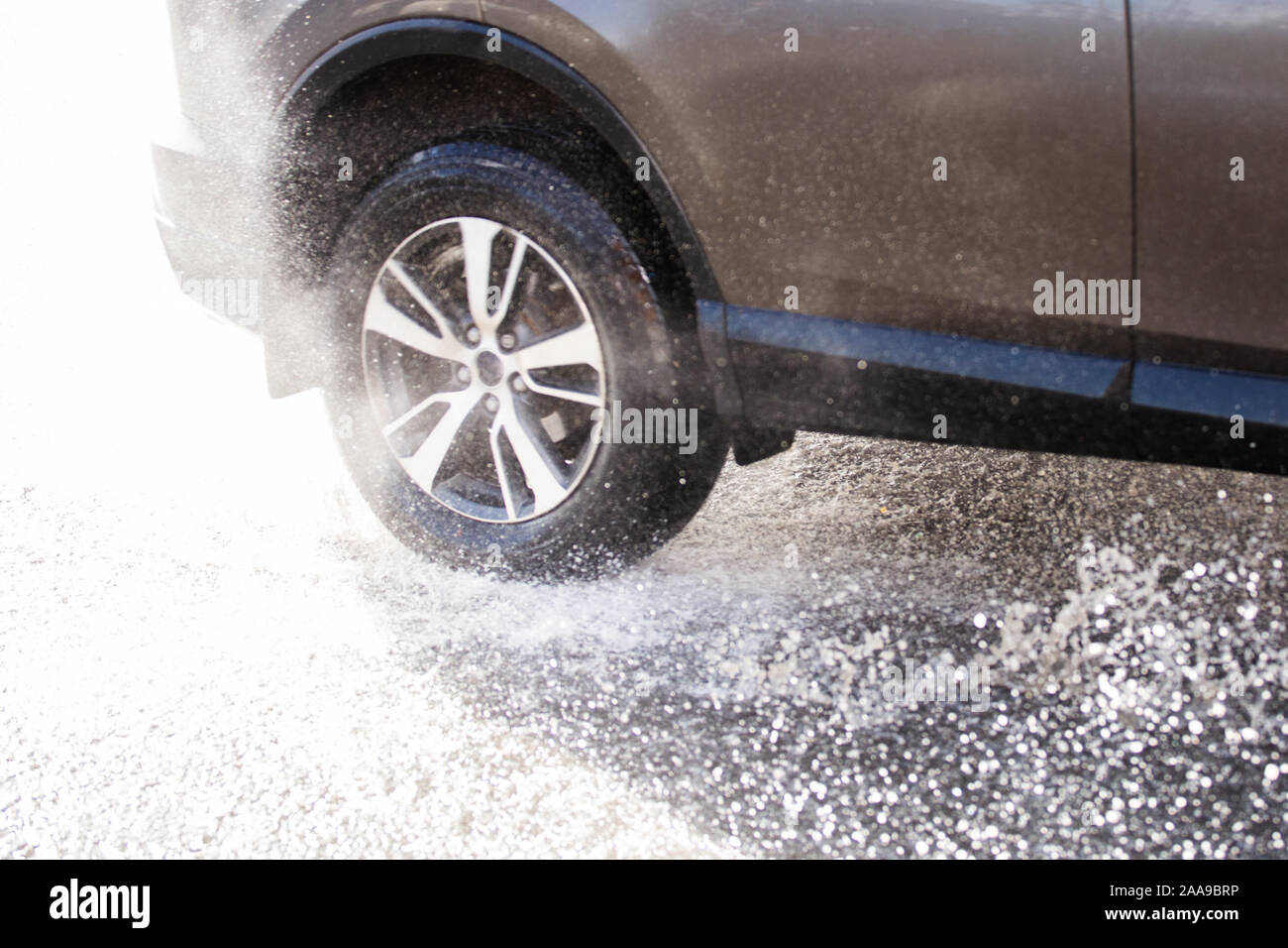 Car tire splashing in water hi-res stock photography and images - Alamy