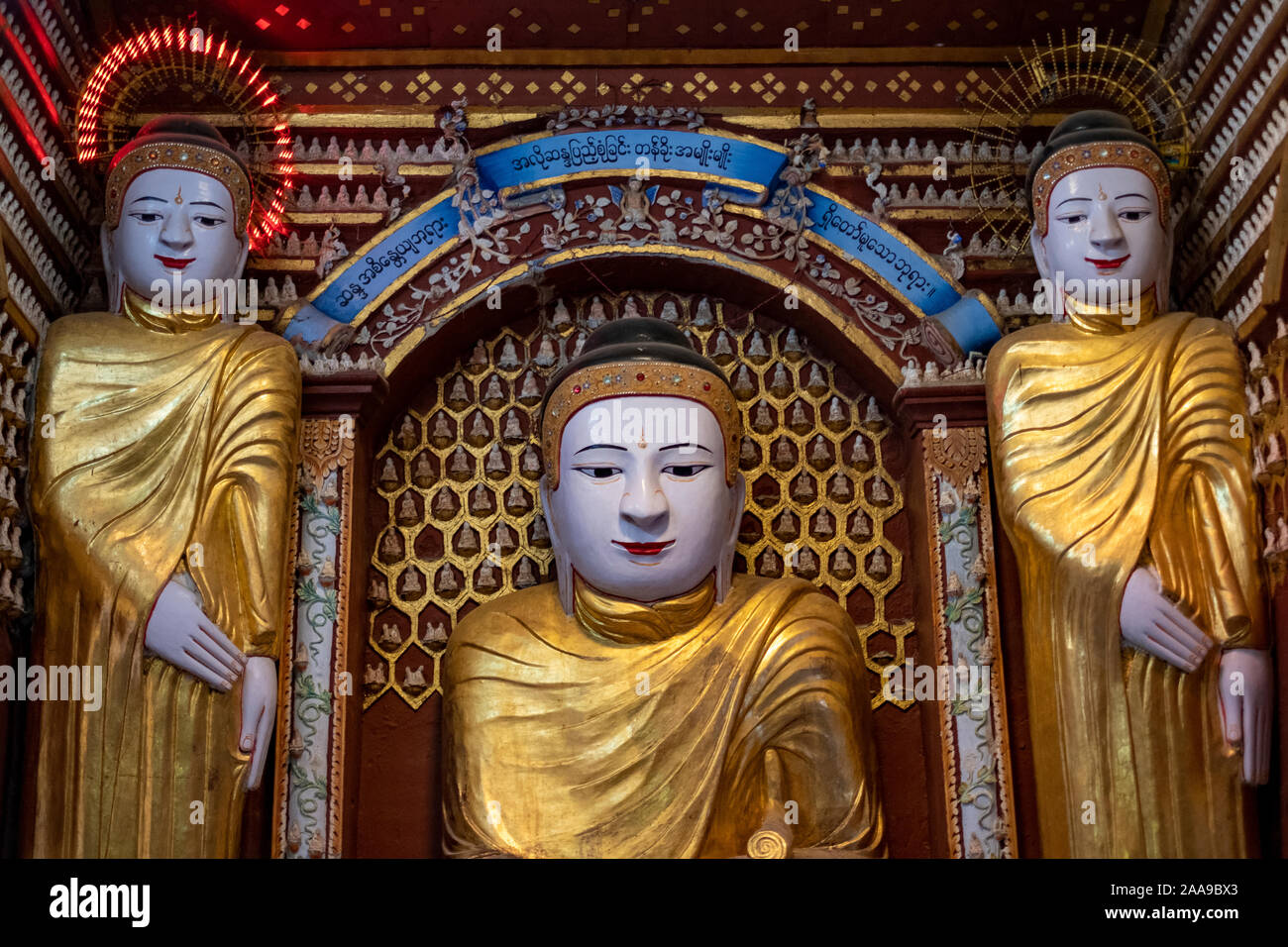 Three standing buddhas golden temple hi-res stock photography and ...