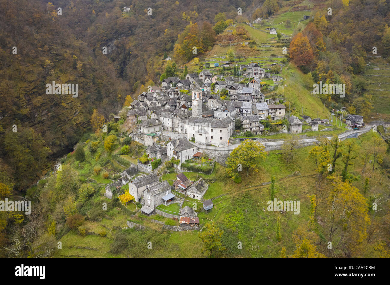 Autumnal view of the town of Corippo, the town with less inhabitants of ...