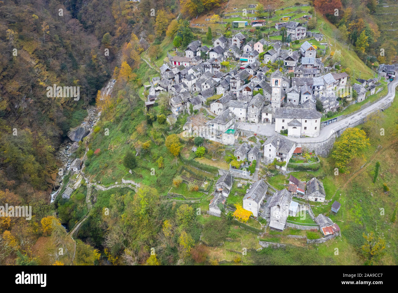 Autumnal view of the town of Corippo, the town with less inhabitants of ...