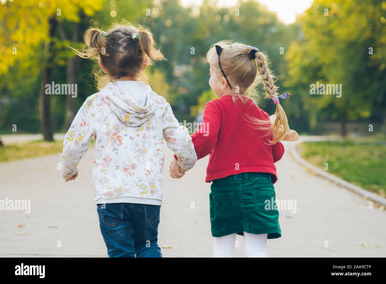 Two Little Girls Best Friends Holding Hands