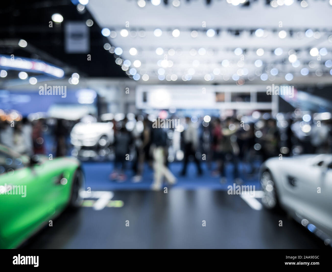 Blur the background of the motor show. Abstract blur people at motor ...