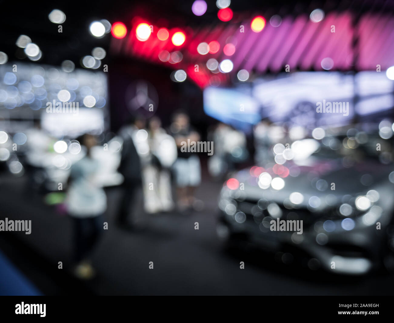 Blur the background of the motor show. Abstract blur people at motor ...