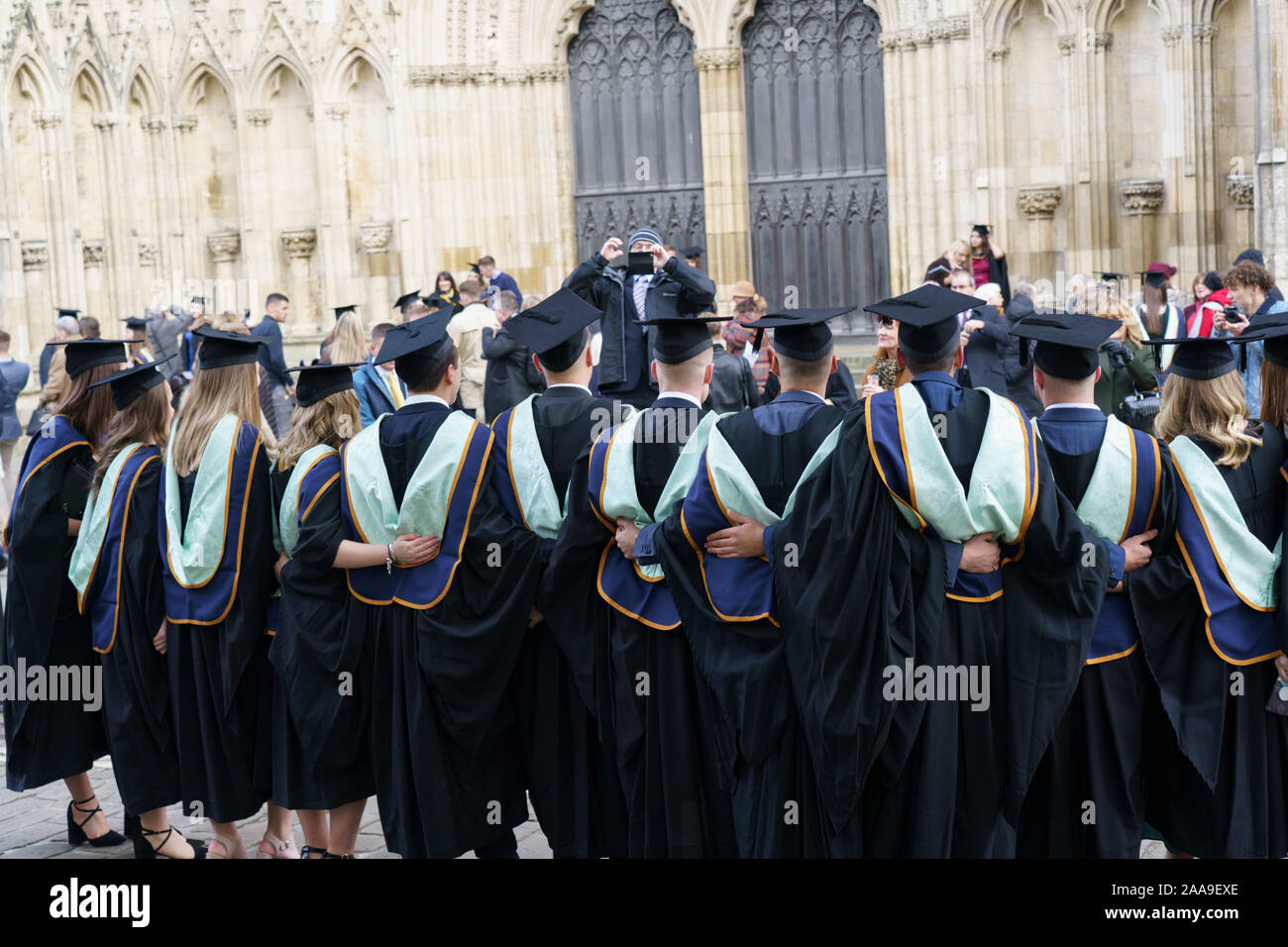 A line of male and female York St John University Students posing for ...