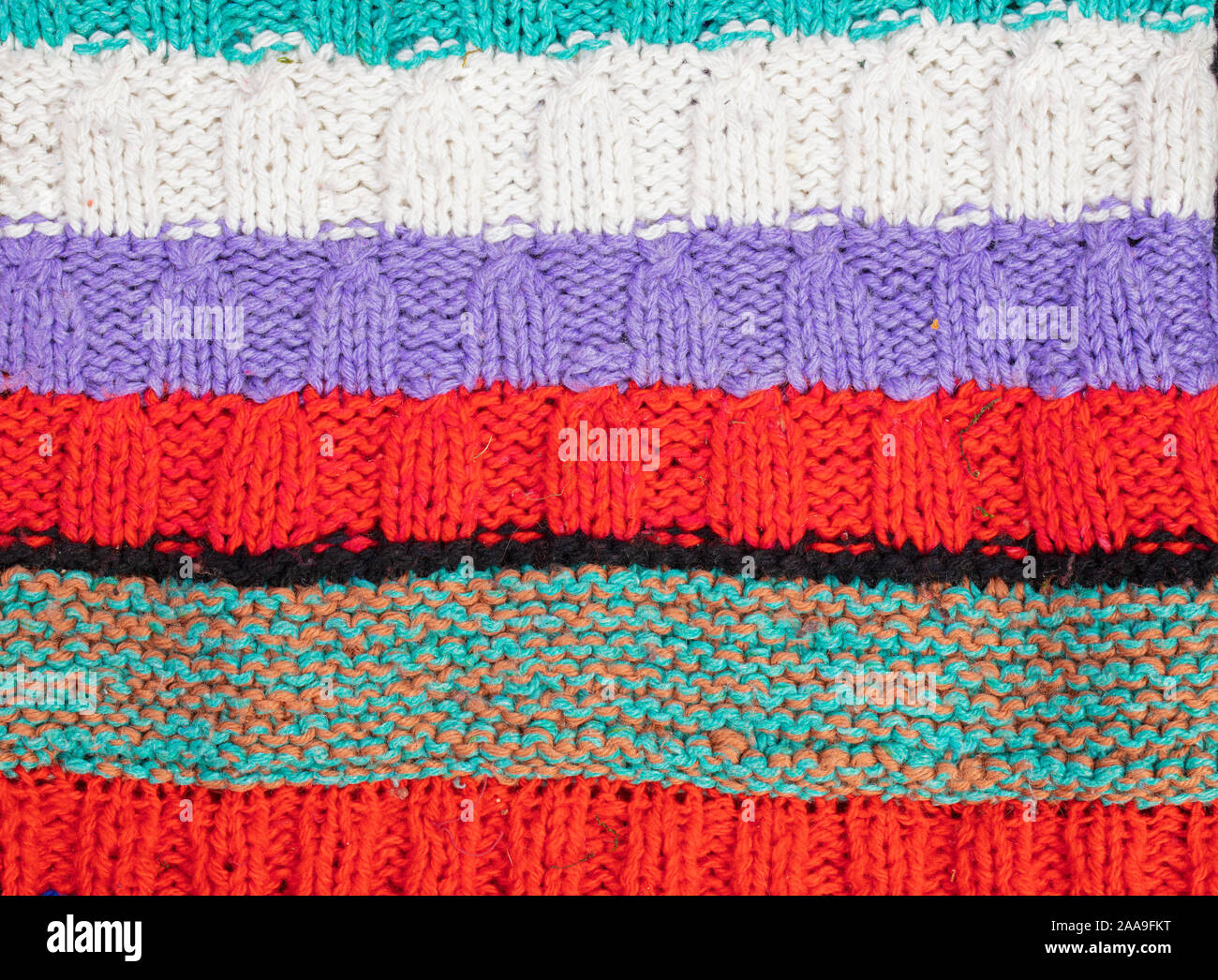 Knitted multi-colored texture. Background knitted product close-up ...