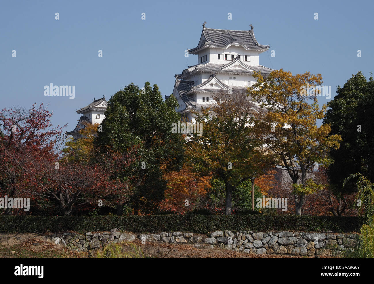 A view of the Himeji Castle with fall foliage in Himeji, Japan Stock ...
