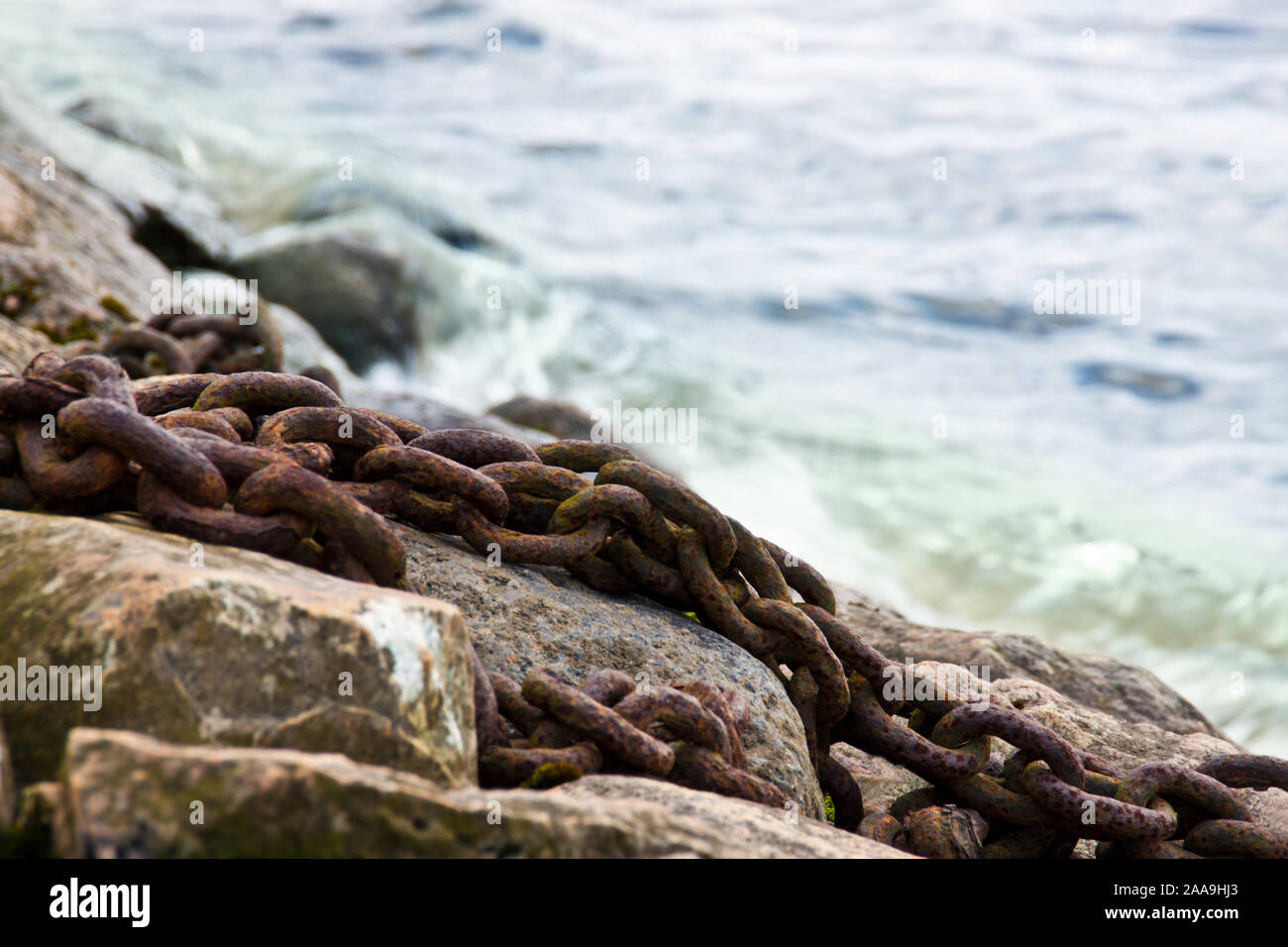 Anchor chain and sea background Stock Photo - Alamy