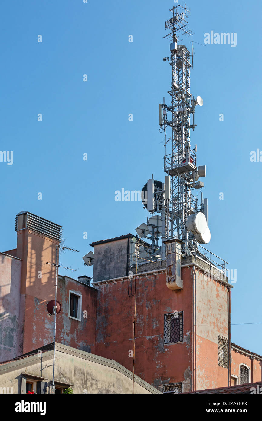 Communication Antenna Mast Structure at Top of Building Stock Photo - Alamy
