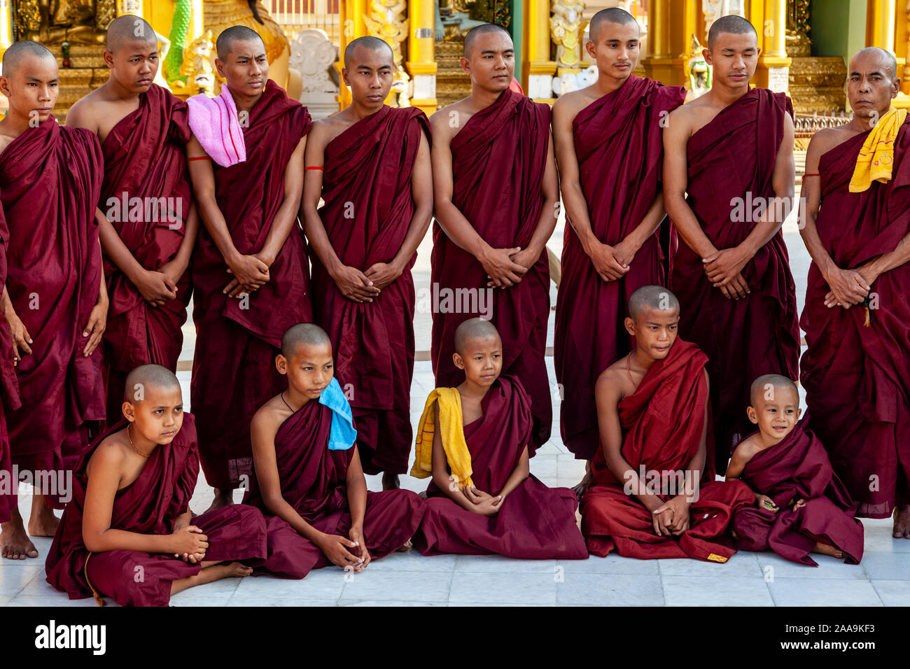 A Group Of Monks Pose For A Photo At The Shwedagon Pagoda, Yangon ...