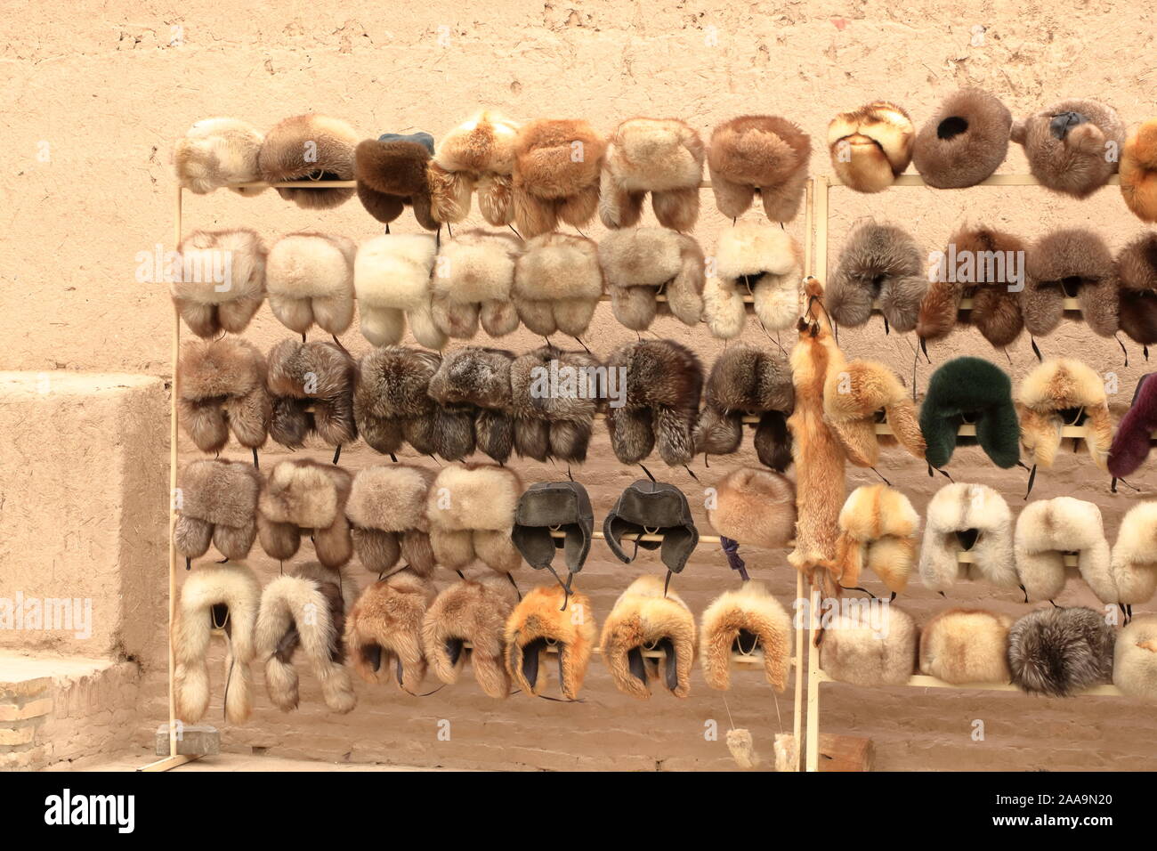 Sale of fur caps in a market in uzbekistan Stock Photo - Alamy