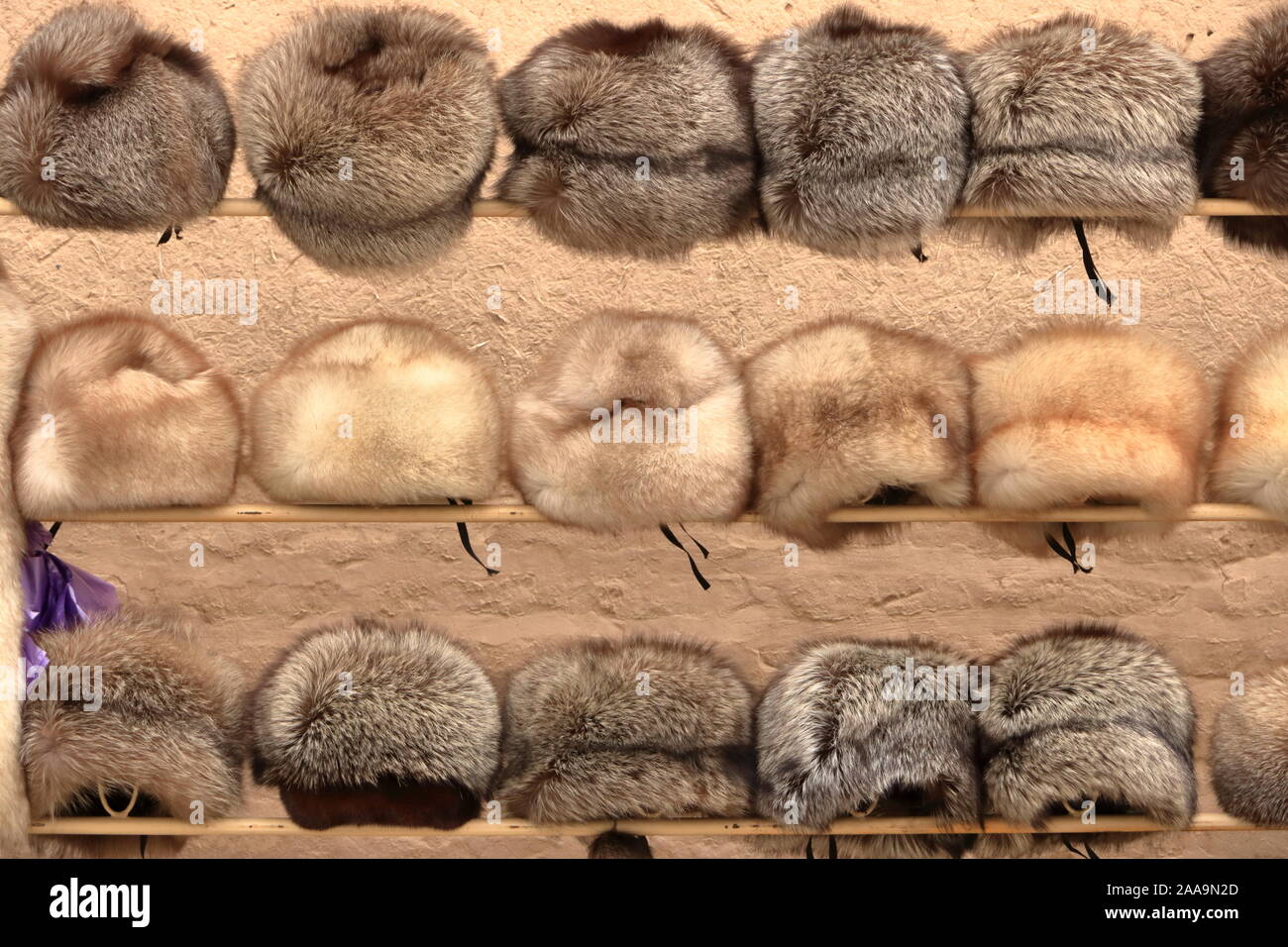 Sale of fur caps in a market in uzbekistan Stock Photo - Alamy