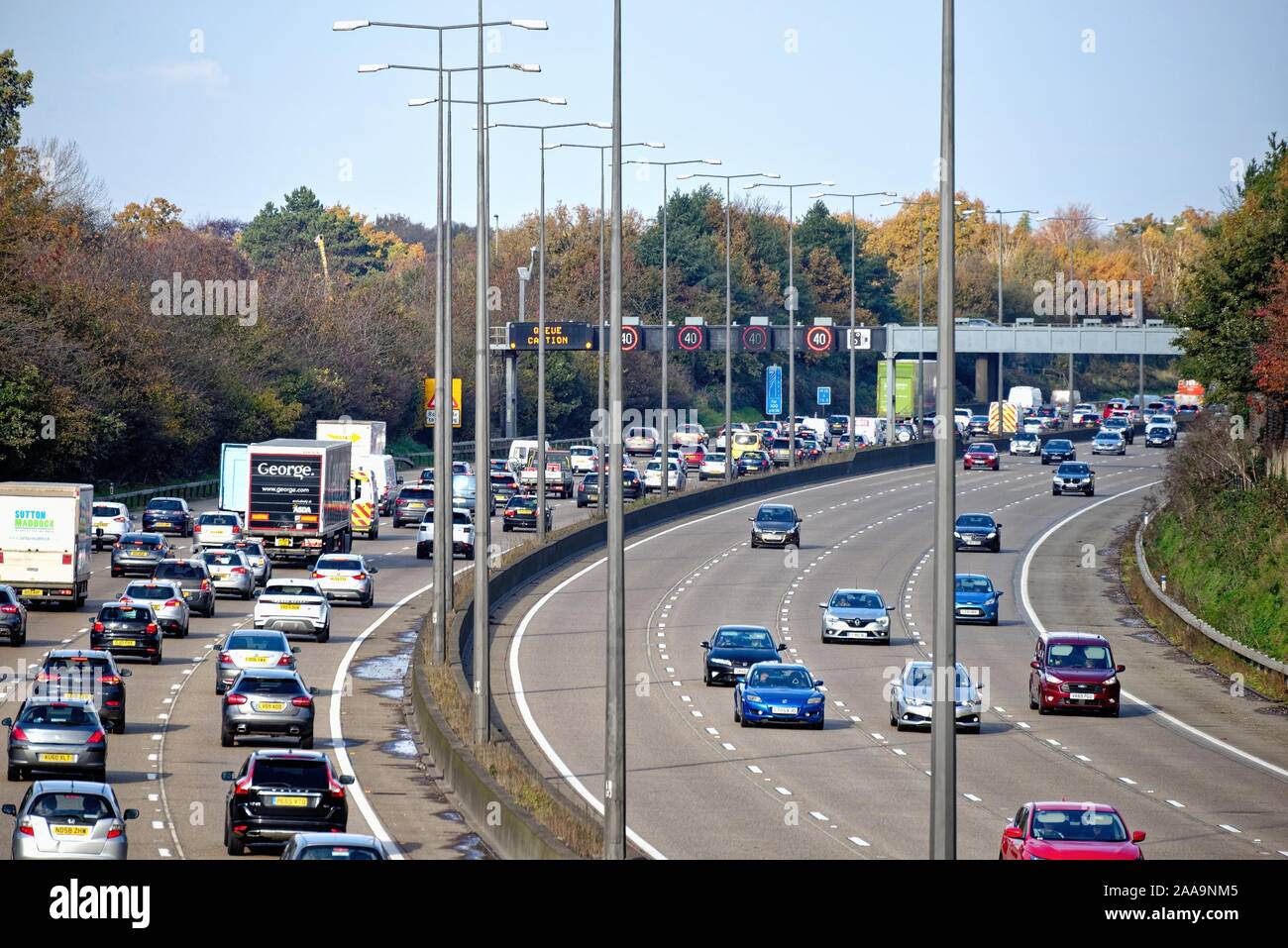 A congested clockwise section of the M25 motorway between Junction 10 ...