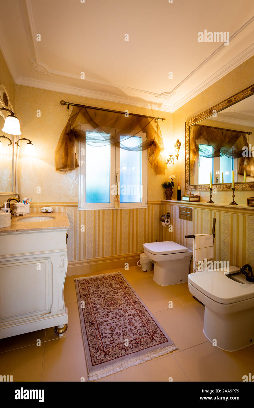 Toilet room in beige tones Stock Photo - Alamy