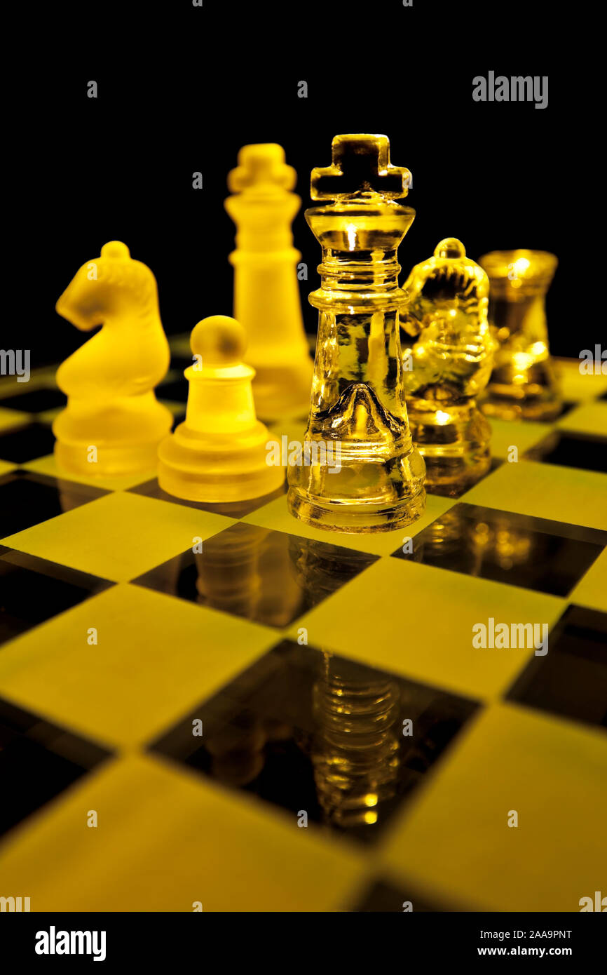 Glass Chess Board and Pieces in Yellow Stock Photo - Alamy