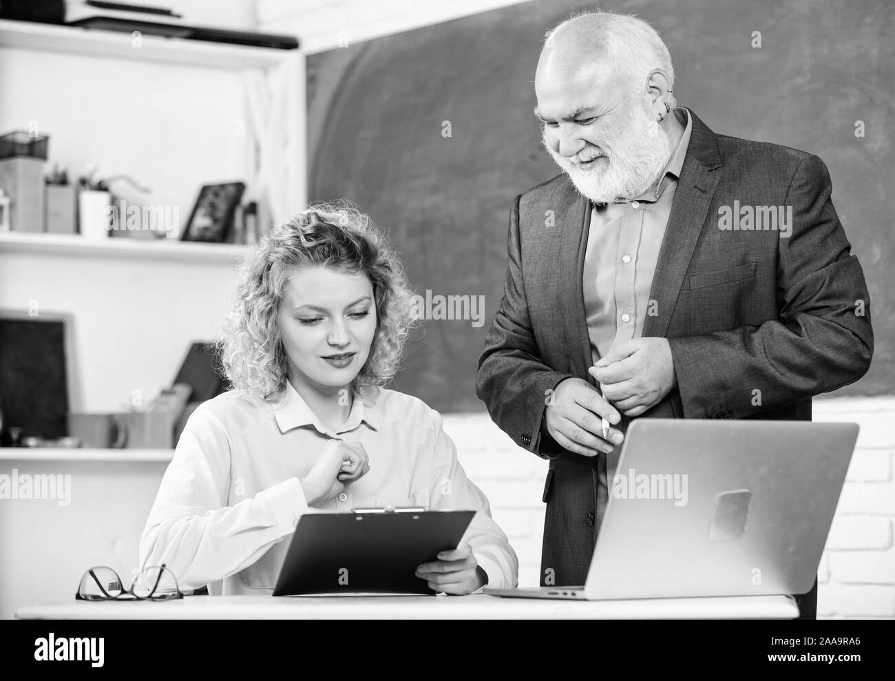 Difficult tasks. Final test and graduation. Lecturer educator helping ...