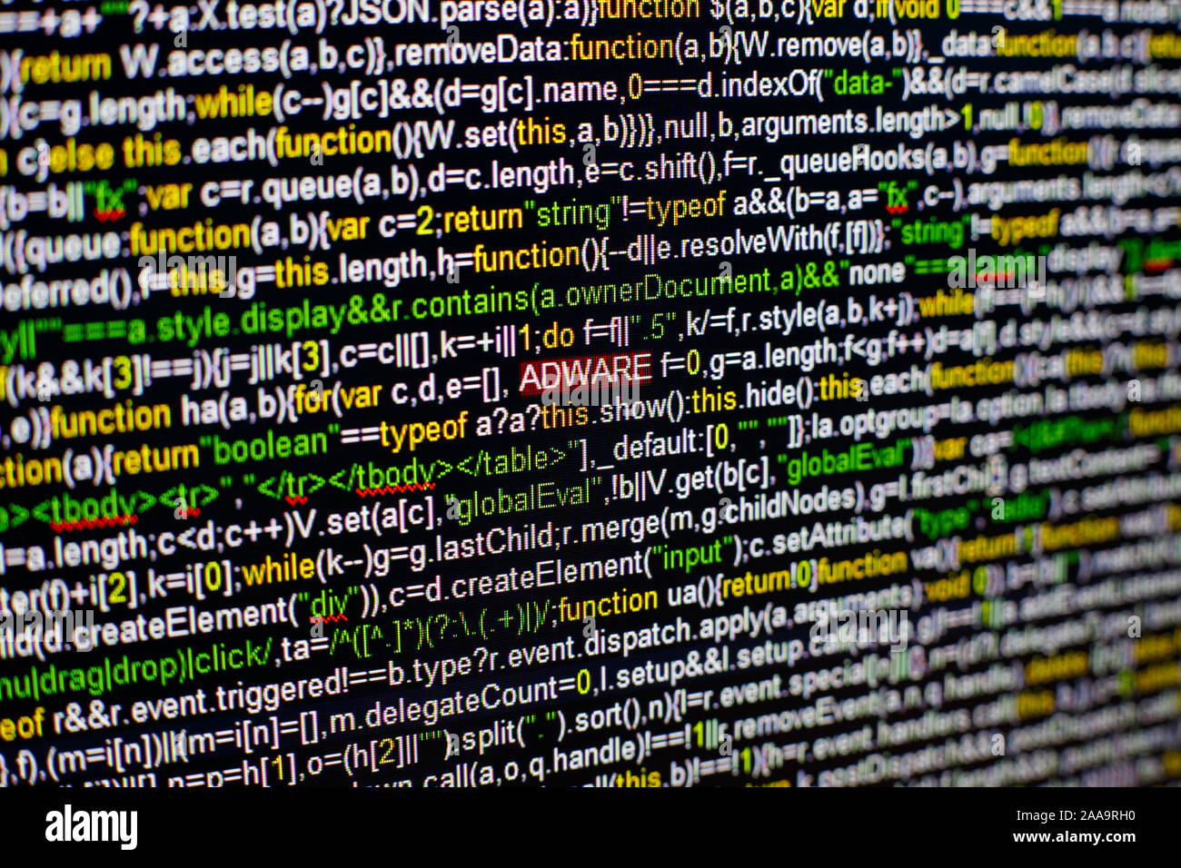 Macro Photo Of Computer Screen With Program Source Code And Highlighted Adware Inscription In 2792