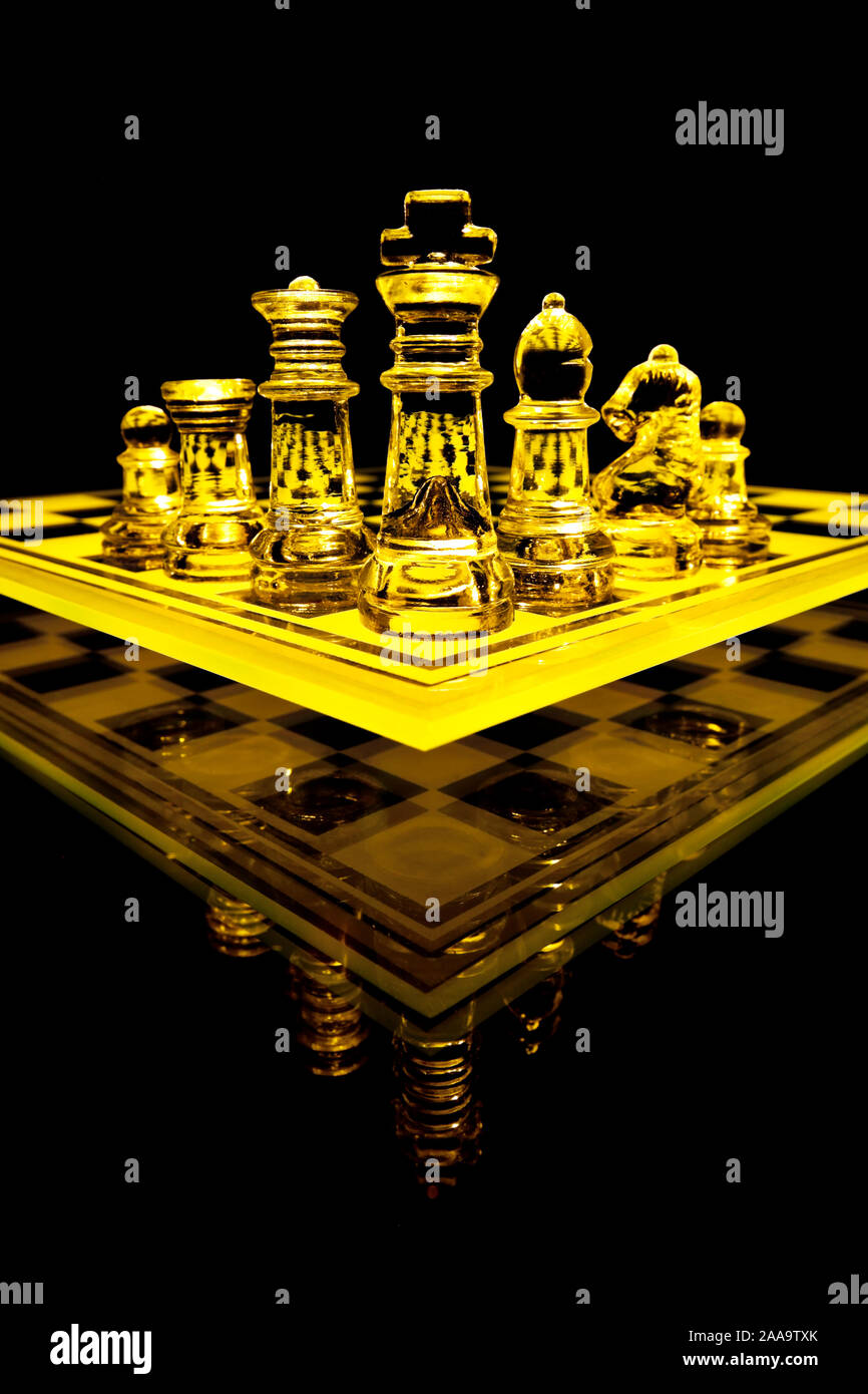 Glass Chess Board and Pieces in Yellow Stock Photo - Alamy