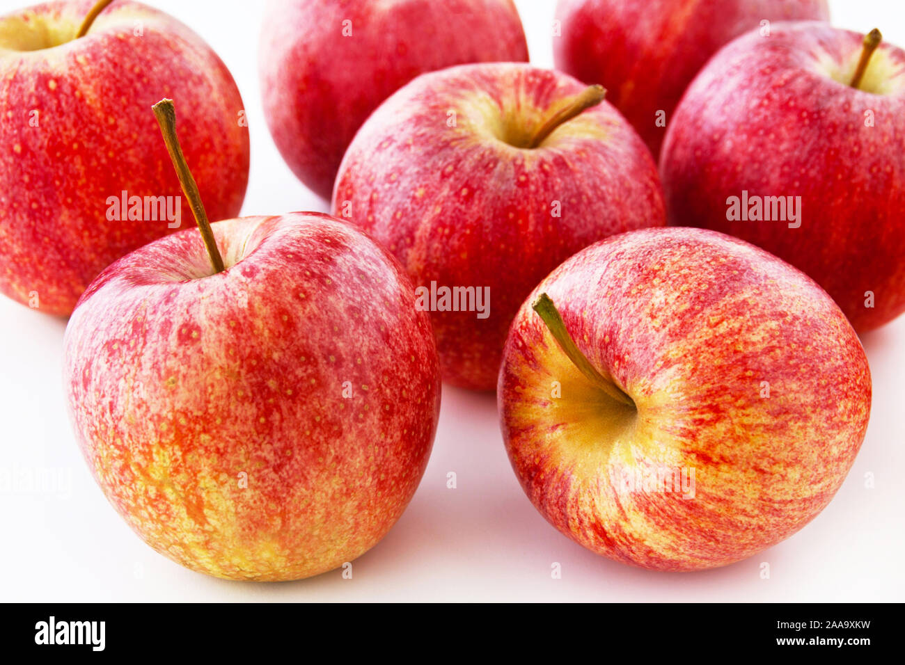 Seven apples on white background Stock Photo - Alamy