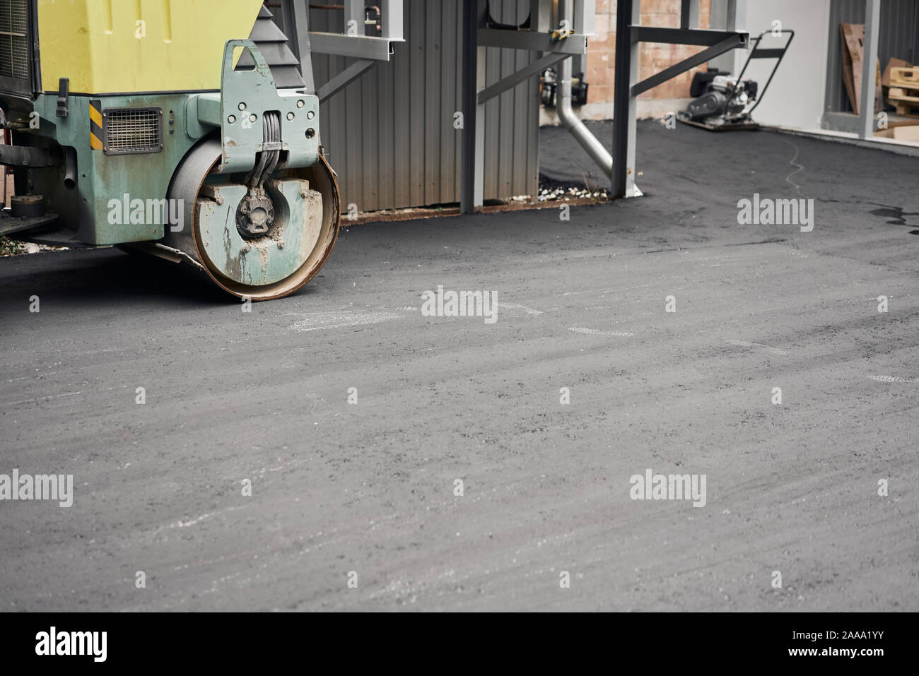 Asphalt Compactors is carrying out road repair work. Laying new asphalt ...