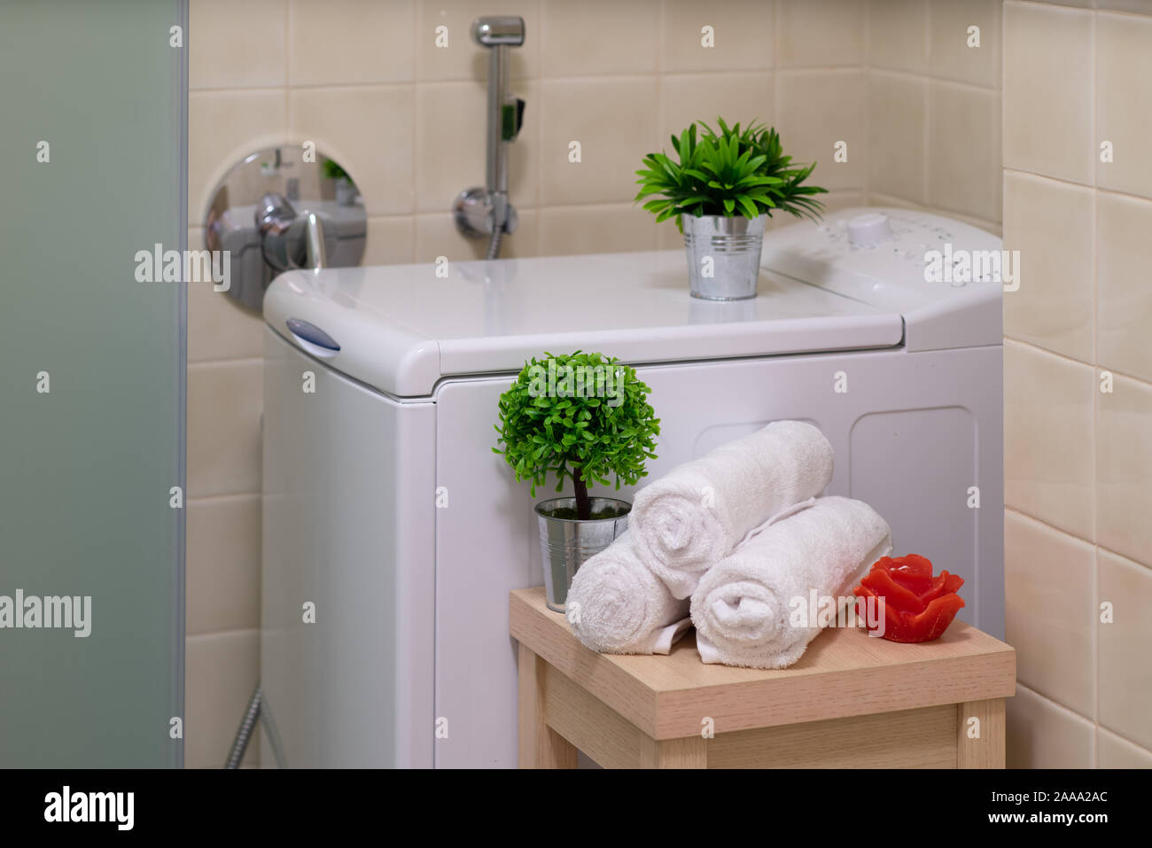Modern interior of bathroom. Washing machine Stock Photo - Alamy
