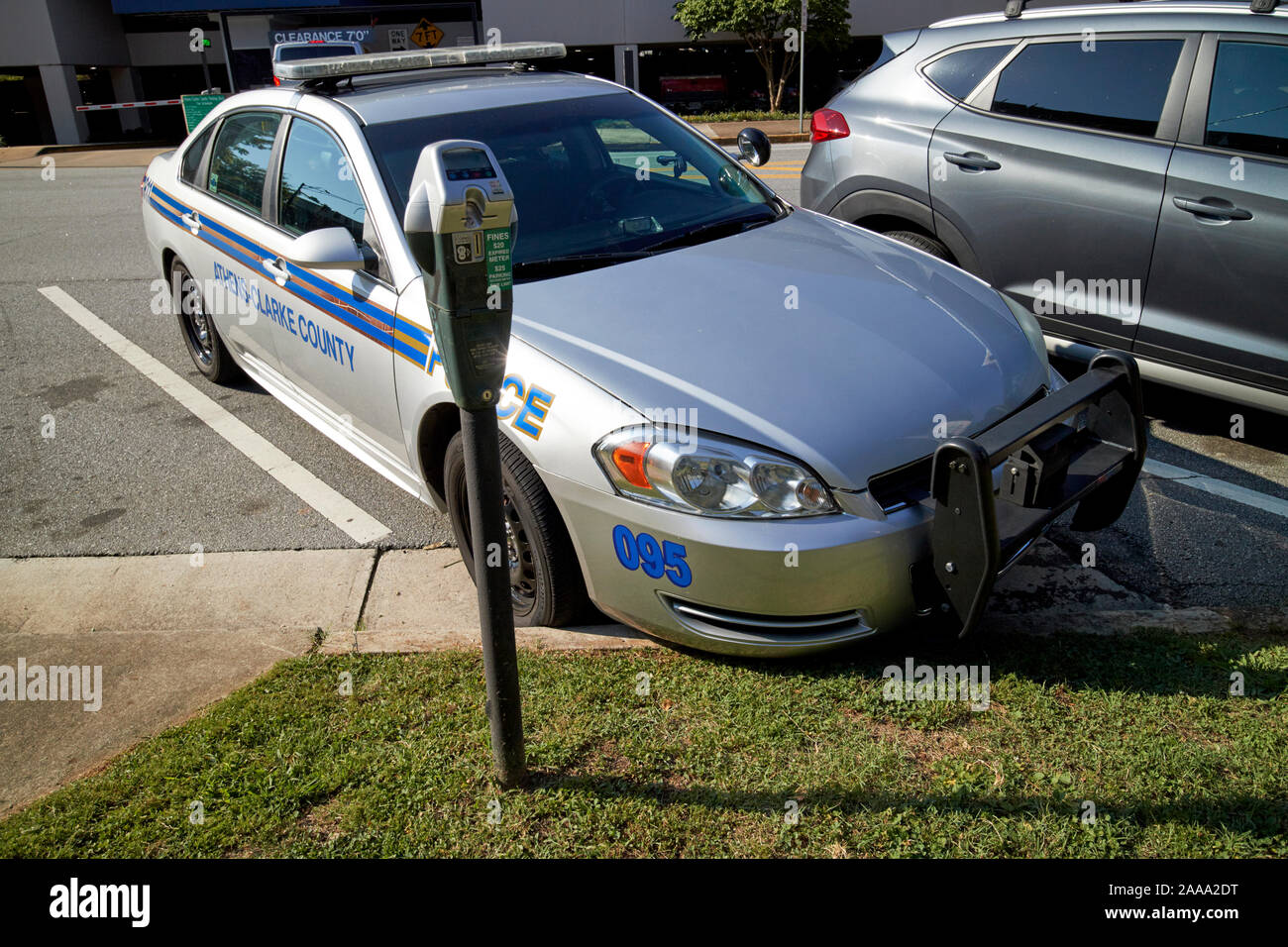 athens-clarke police department police car parked at a parking meter ...