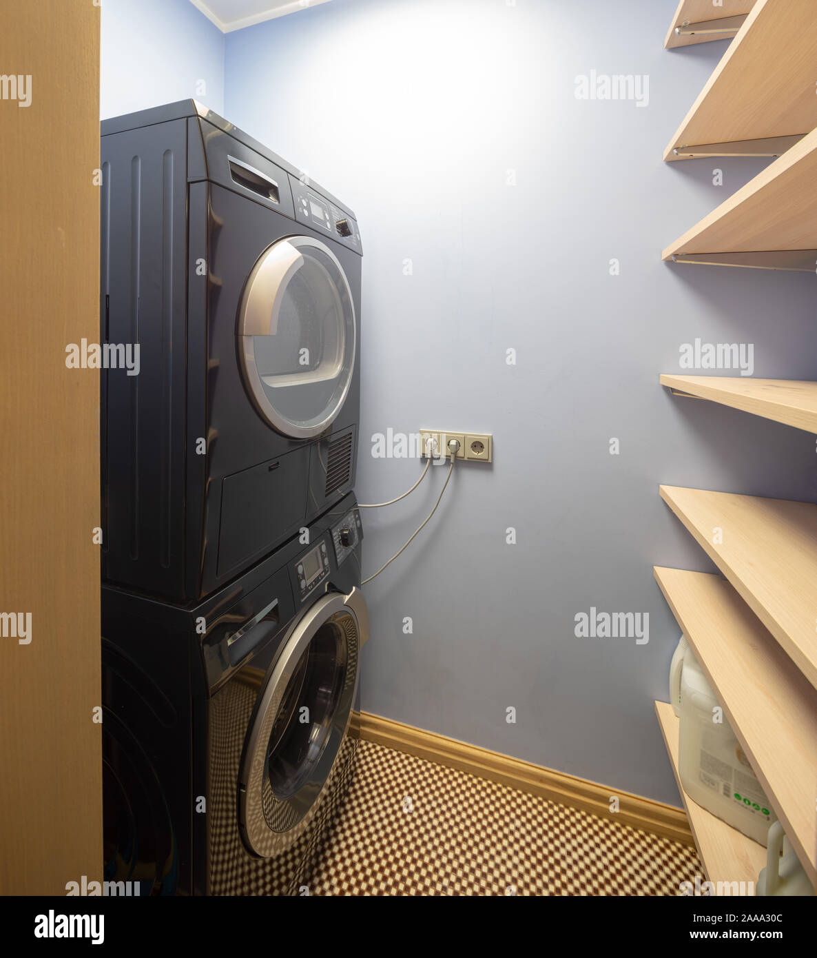 Home appliances. Washing machine. Wooden shelves Stock Photo - Alamy