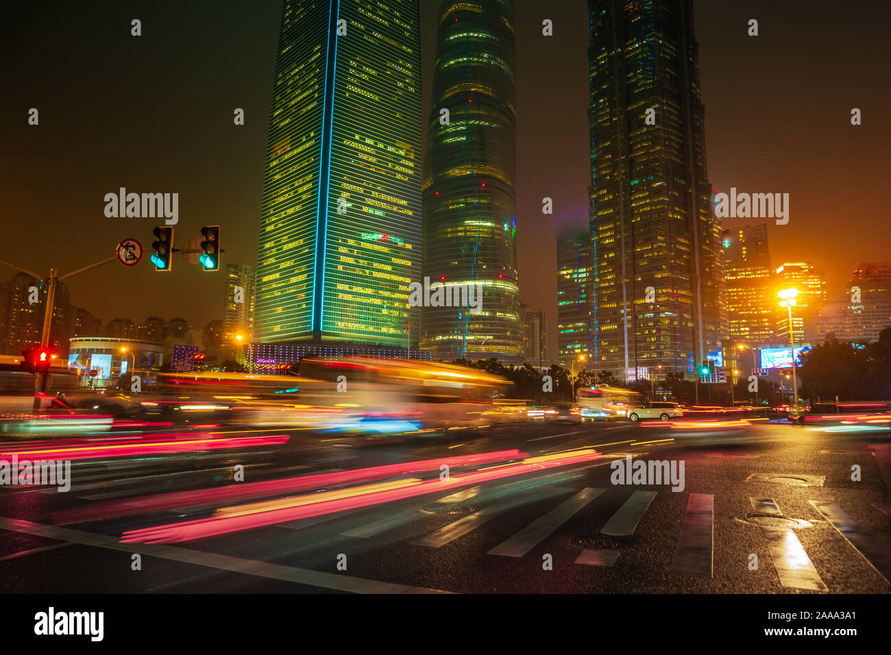 Light trails on the modern building background in Shanghai, China ...