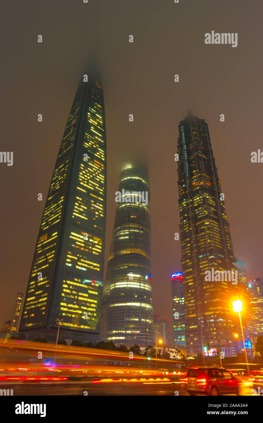 Light trails on the modern building background in Shanghai, China ...