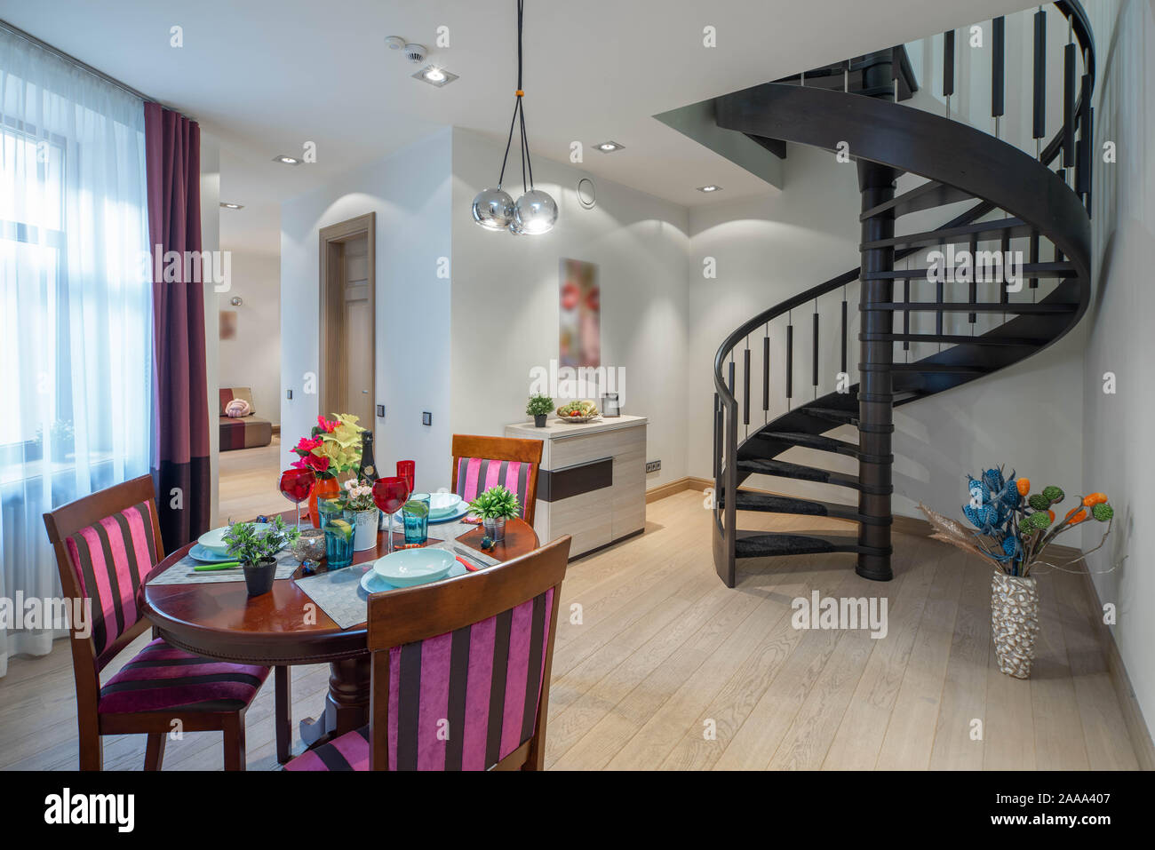 Modern interior of studio apartment. Stairs to the second floor. Set ...