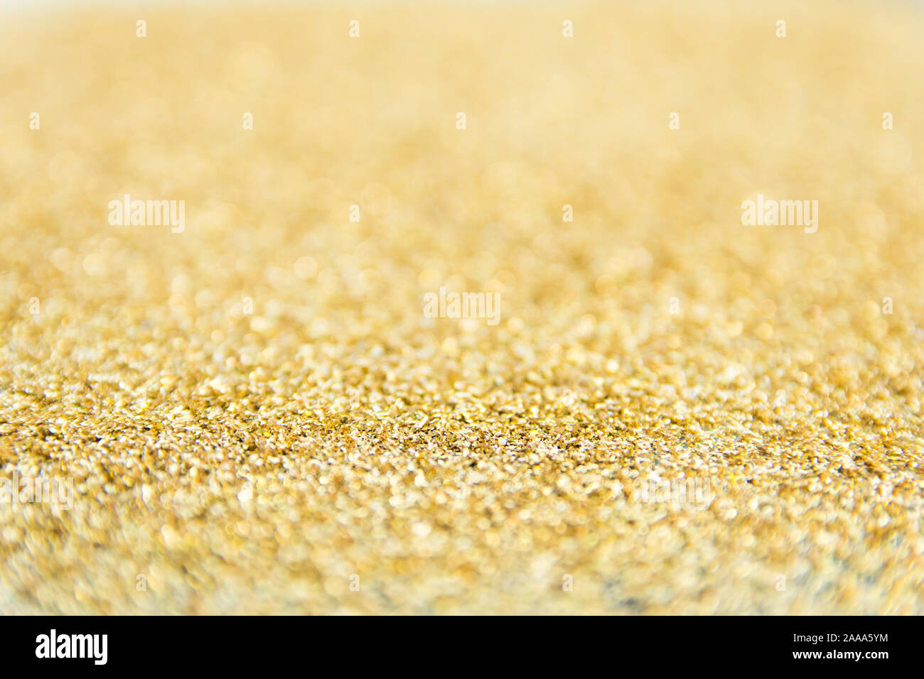 Defocused gold glitter background. Gold abstract bokeh background ...