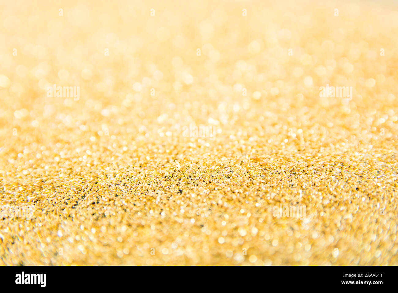 Defocused gold glitter background. Gold abstract bokeh background ...