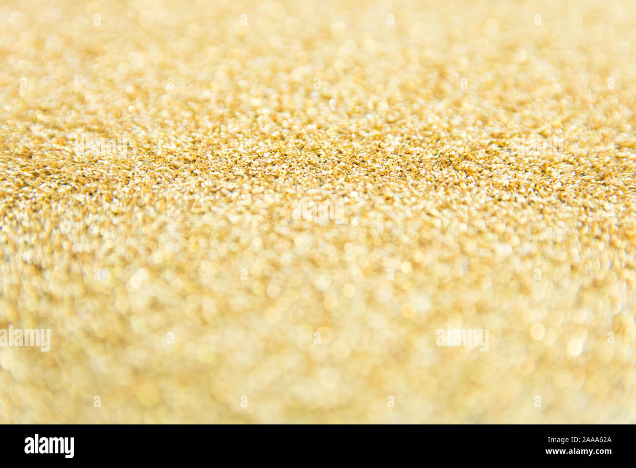 Defocused gold glitter background. Gold abstract bokeh background ...