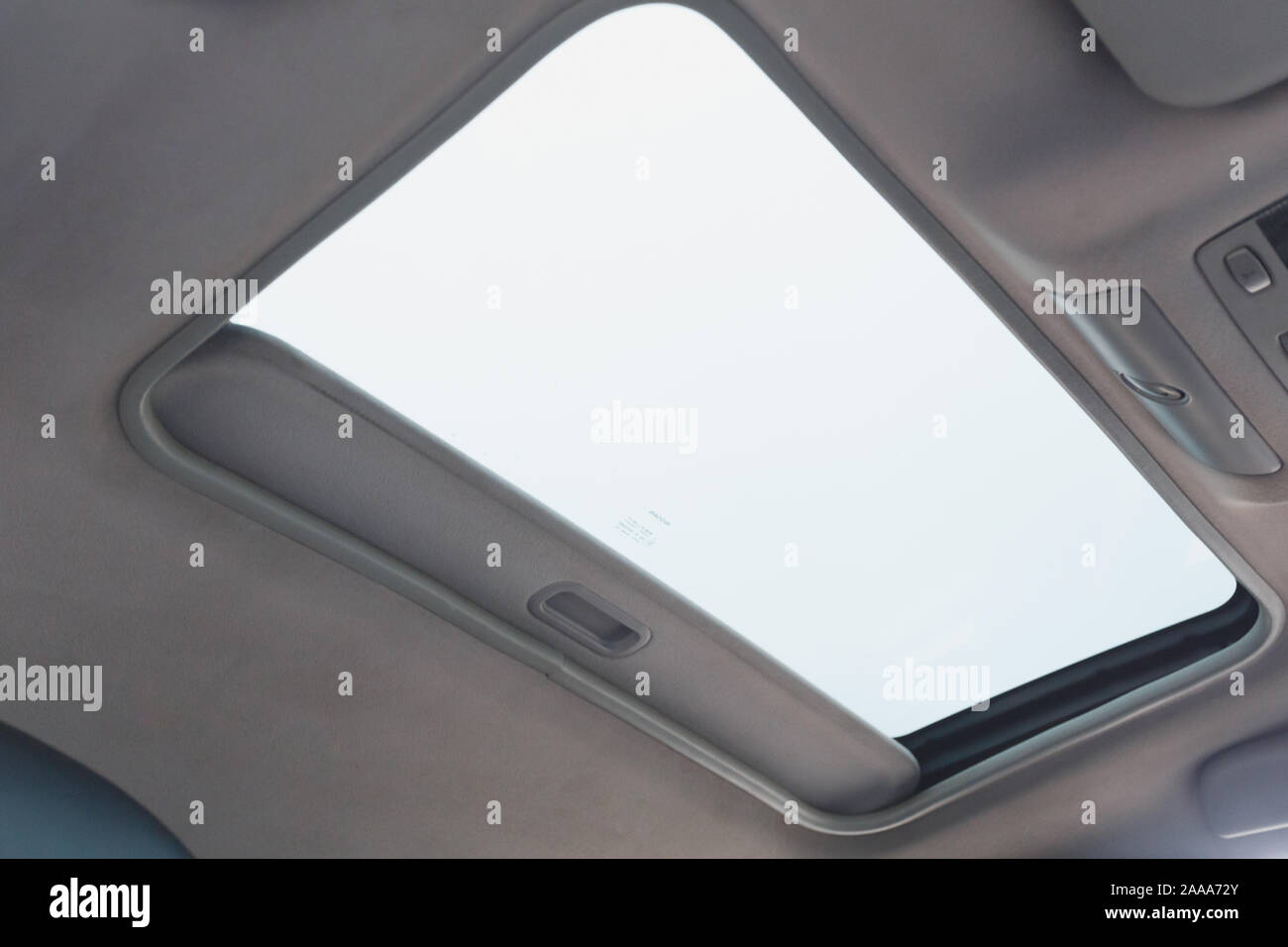 Automotive sunroof close up, white ceiling Stock Photo - Alamy