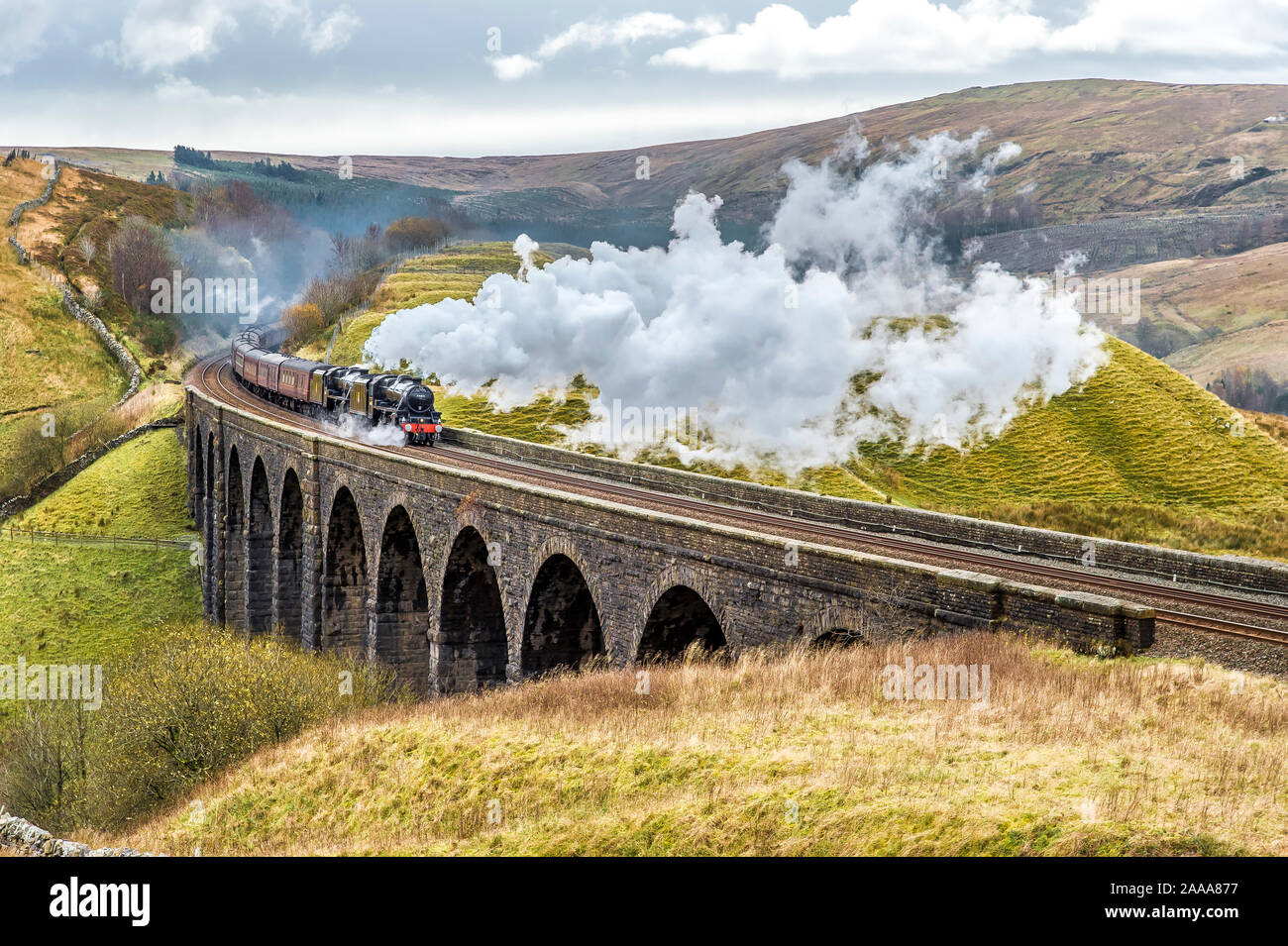 The Citadel nostalgia double header steam train headed by two Black 5s ...
