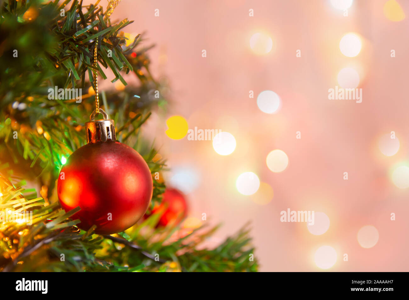 Christmas decoration. Hanging red balls on pine branches Christmas tree ...