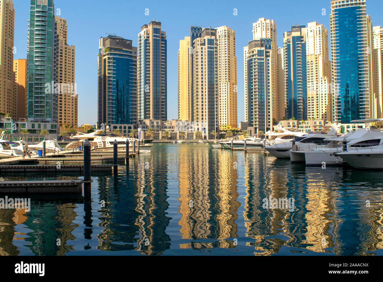 Dubai Marina district with beautiful buildings and yachts. Dubai Marina ...