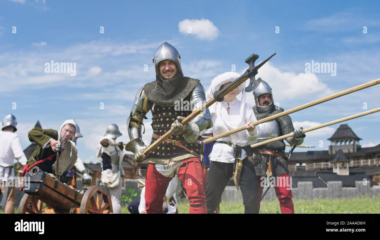 Knights in offensive. Knights defending their fortress, artilleryist ...