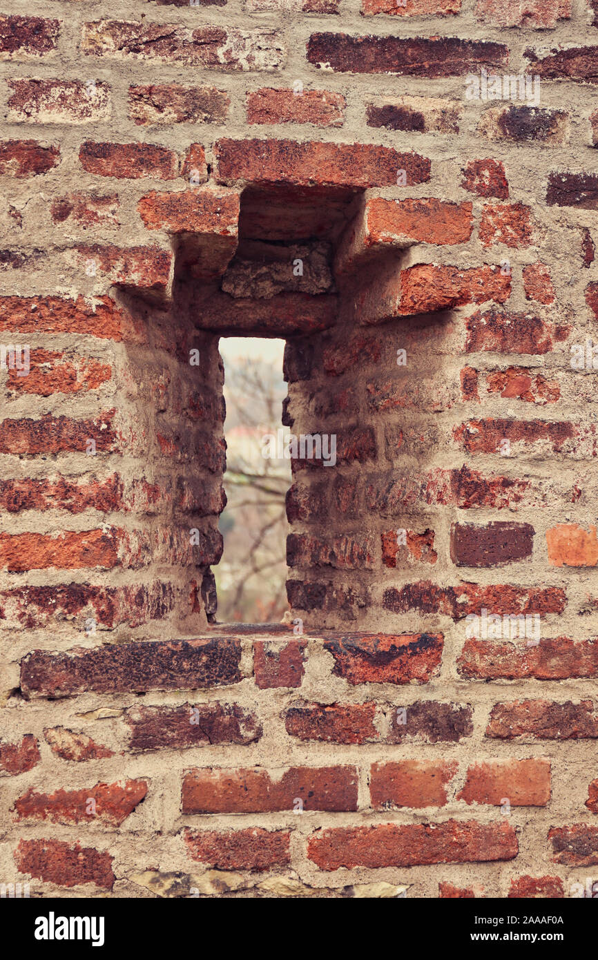 detail of opening / loophole in an old brick / masonry fortification ...