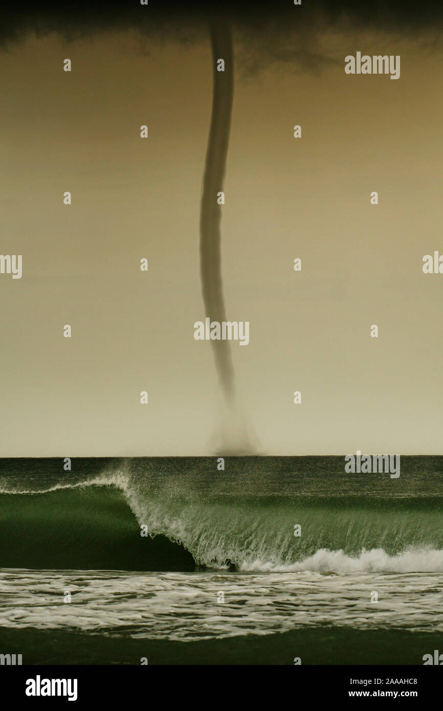 bad weather and storm with the wind on the sea. tornado over the ocean ...