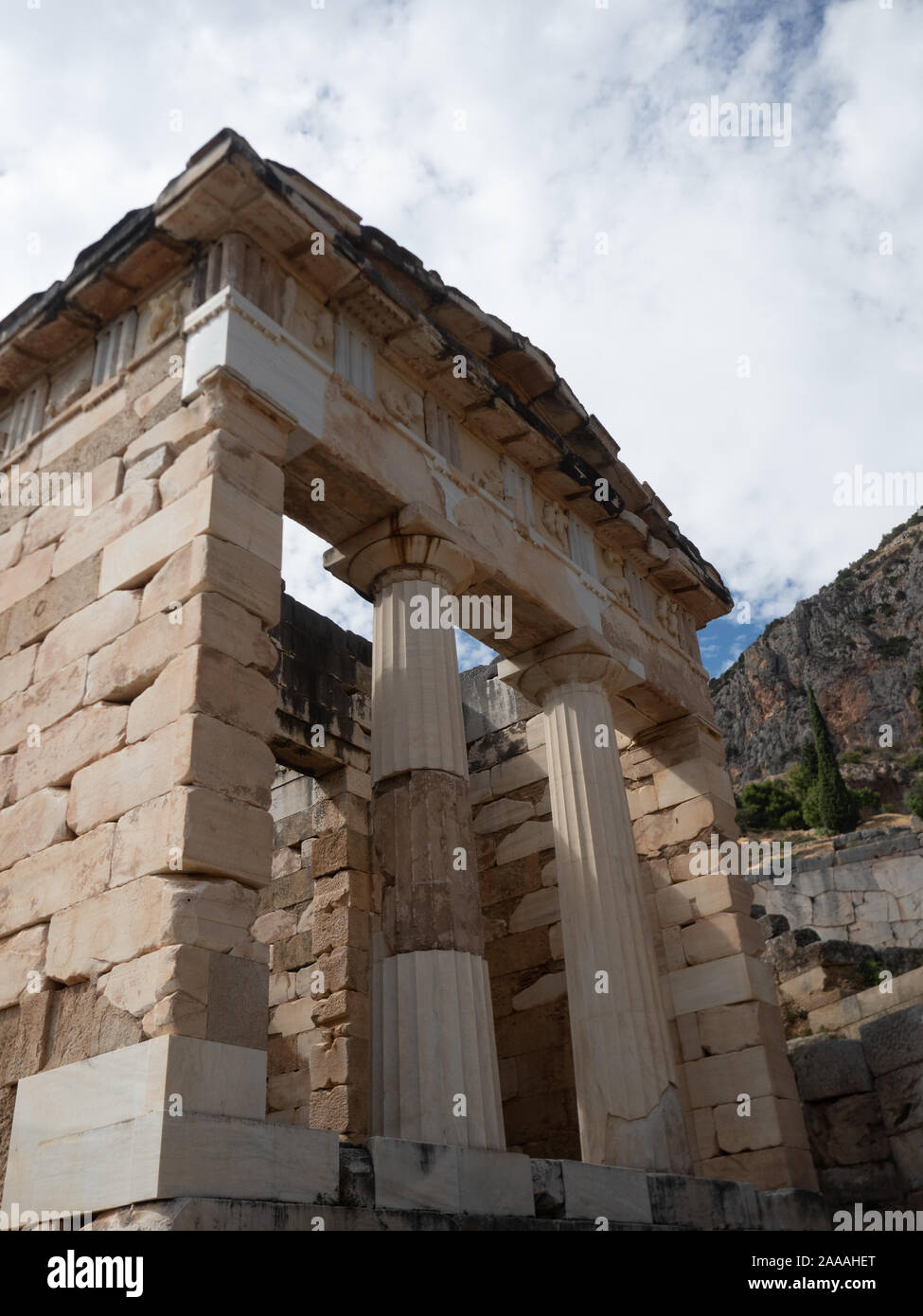 The rebuilt Athenian Treasury with doric columns and stone block ...