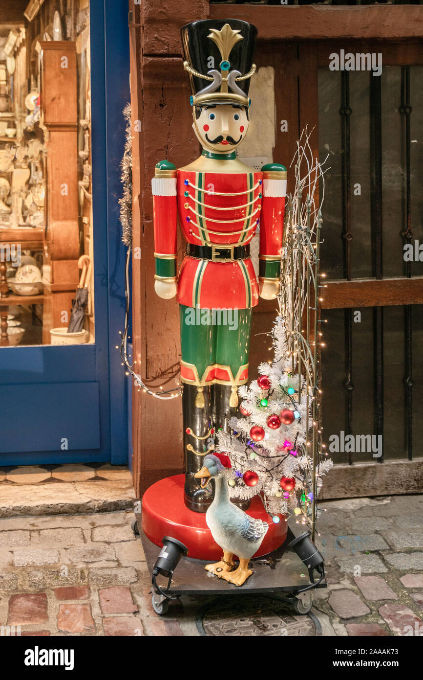 The Nutcracker statue near Christmas decorated stores Stock Photo - Alamy