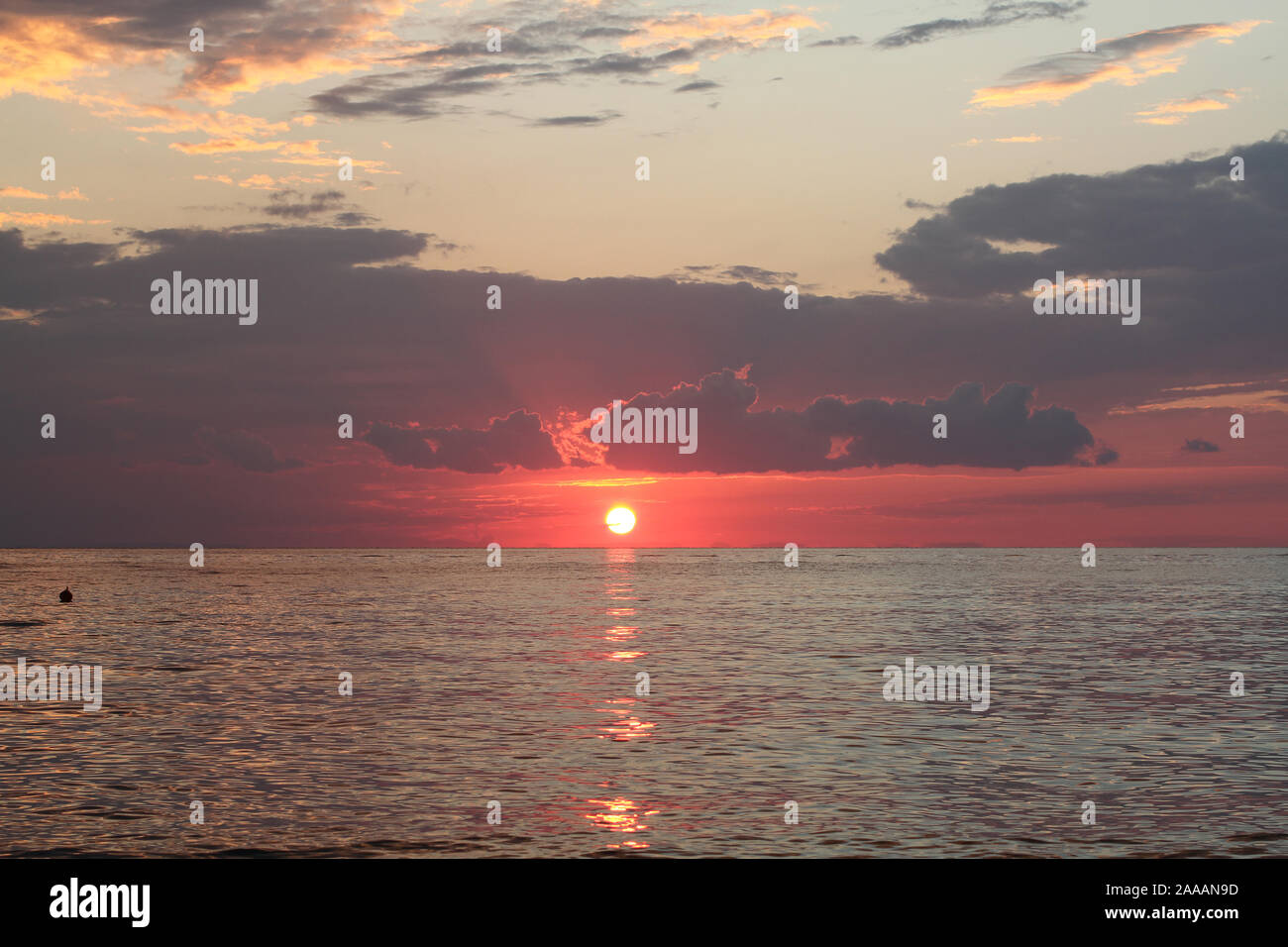 Colorful sunset over the sea Stock Photo - Alamy