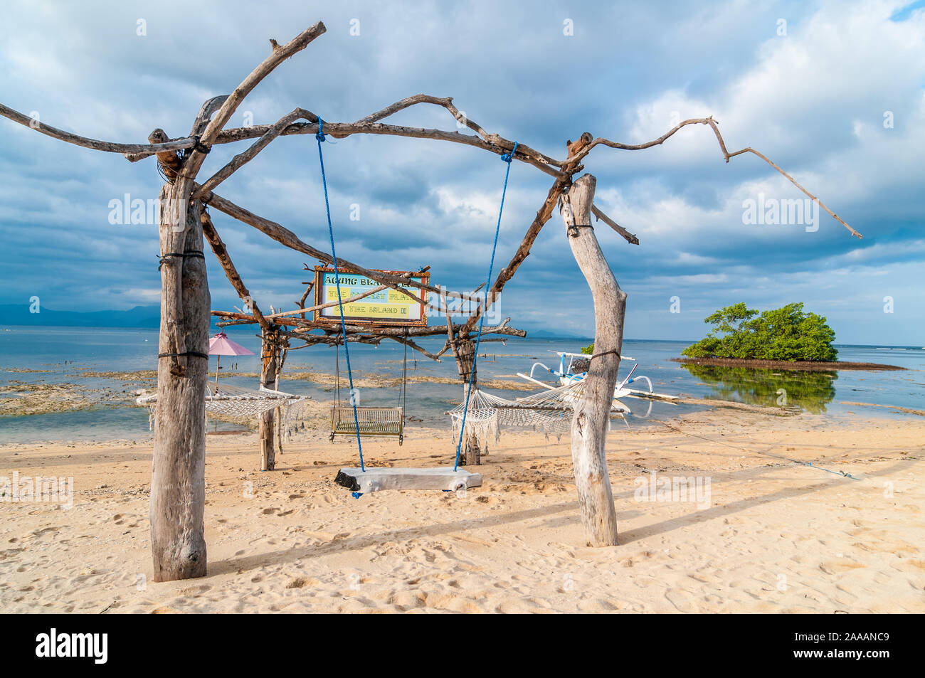 rope swing made with dead trees, Nusa Lembongan, Bali, Indonesia Stock ...