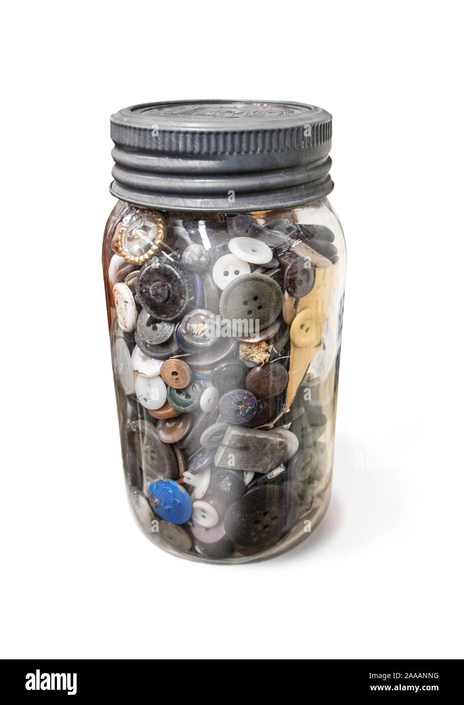 A glass jar filled with very old buttons Stock Photo - Alamy