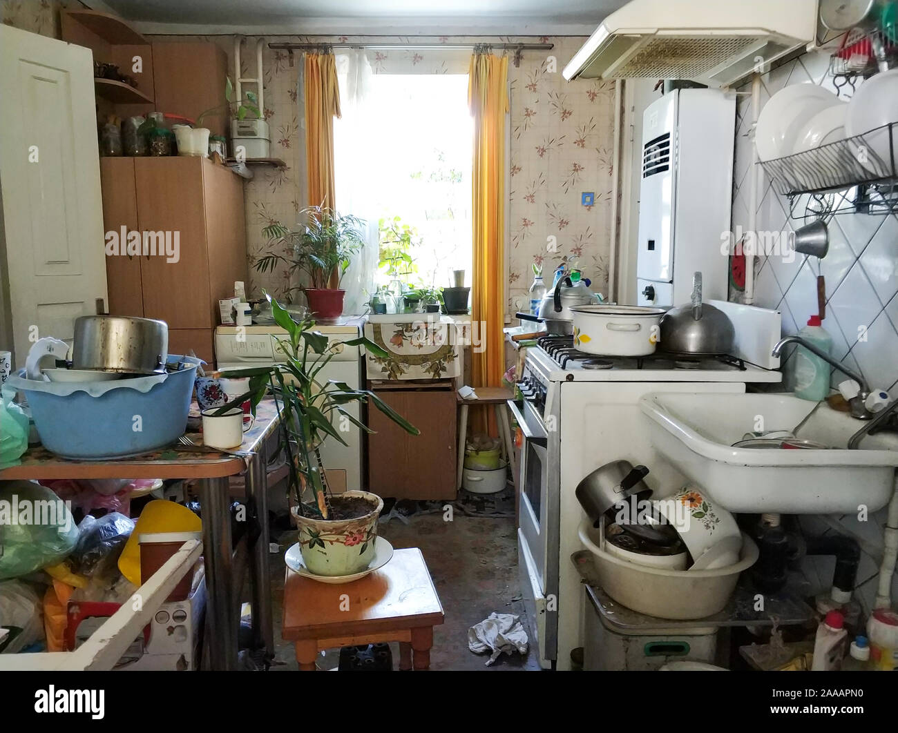 mess and dump. An old room with lots of things. Devastation. Very small ...